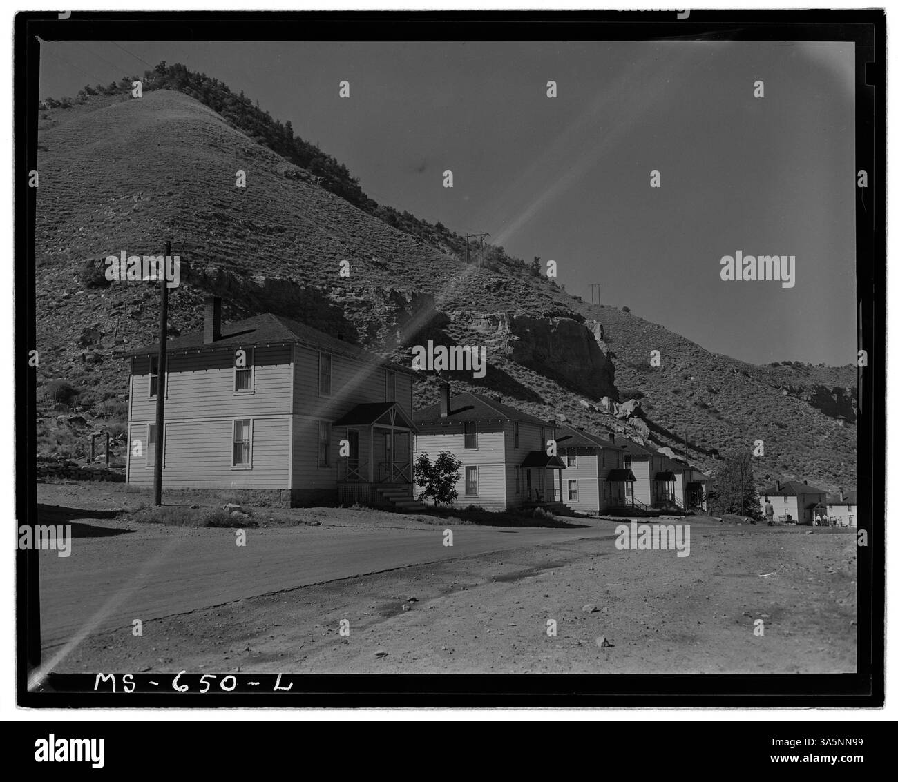 A photograph of a row of houses in the company housing project at Utah ...