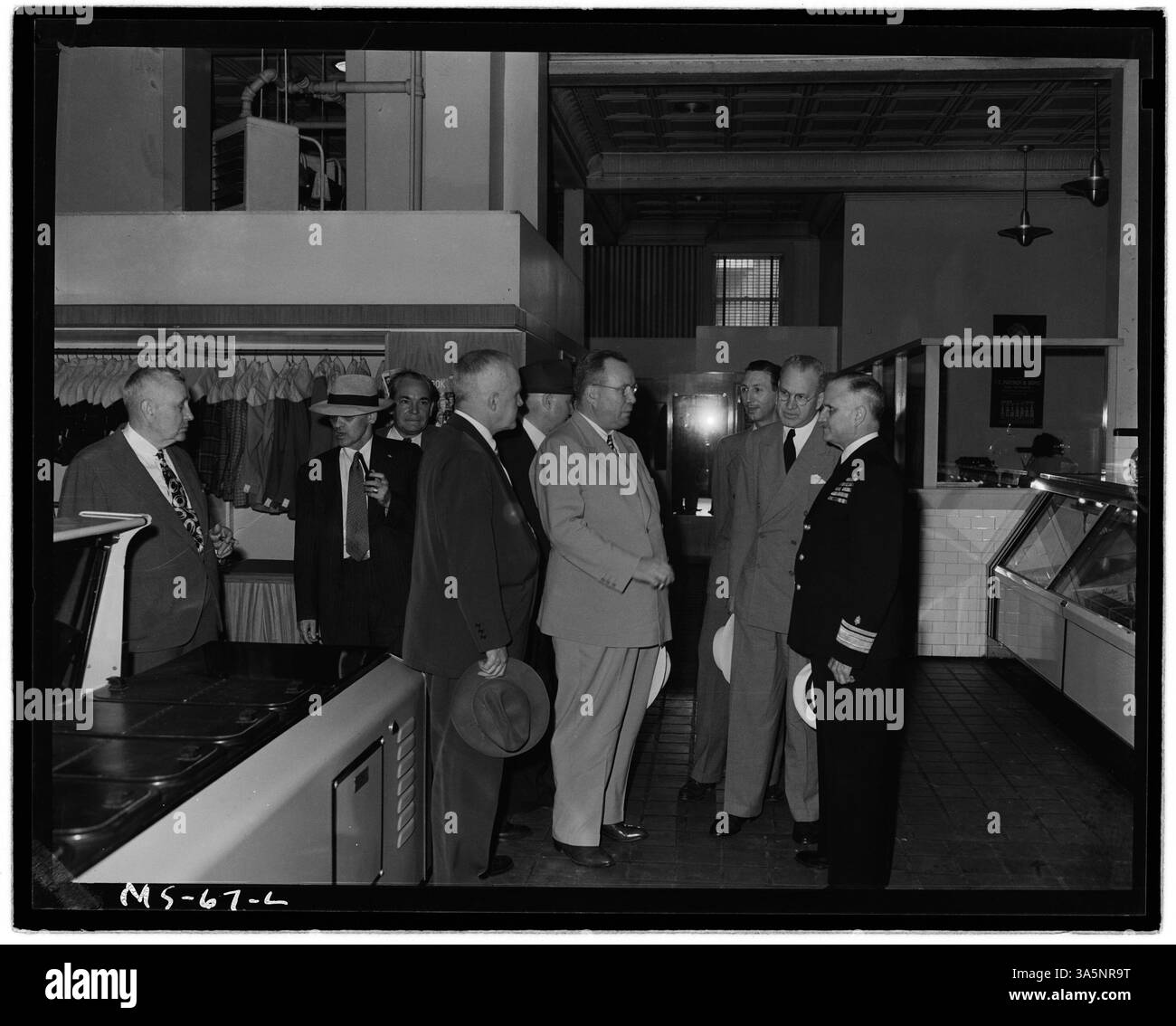 This 1946 photograph shows Rear Admiral Joel T. Boone inspecting a ...