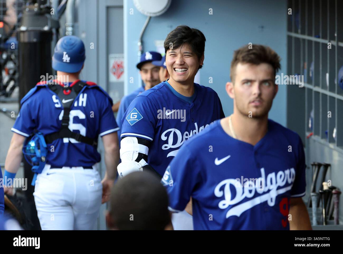 Los Angeles Dodgers' Shohei Ohtani, center, prepares to face the Los ...