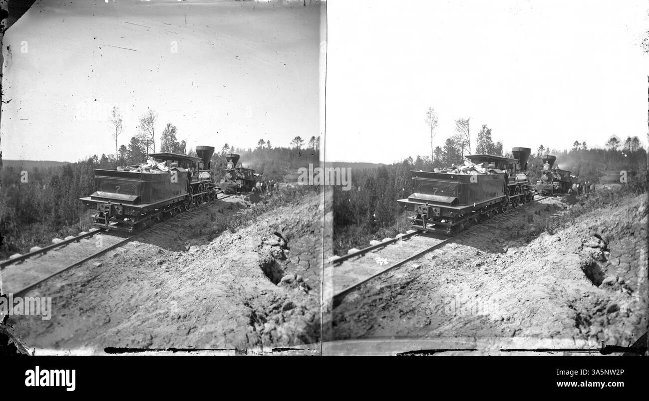 Two Northern Pacific locomotives are positioned on the same track near ...