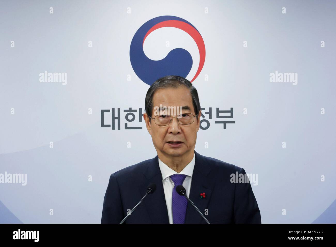 FILE - South Korea's acting President Han Duck-soo speaks at the ...