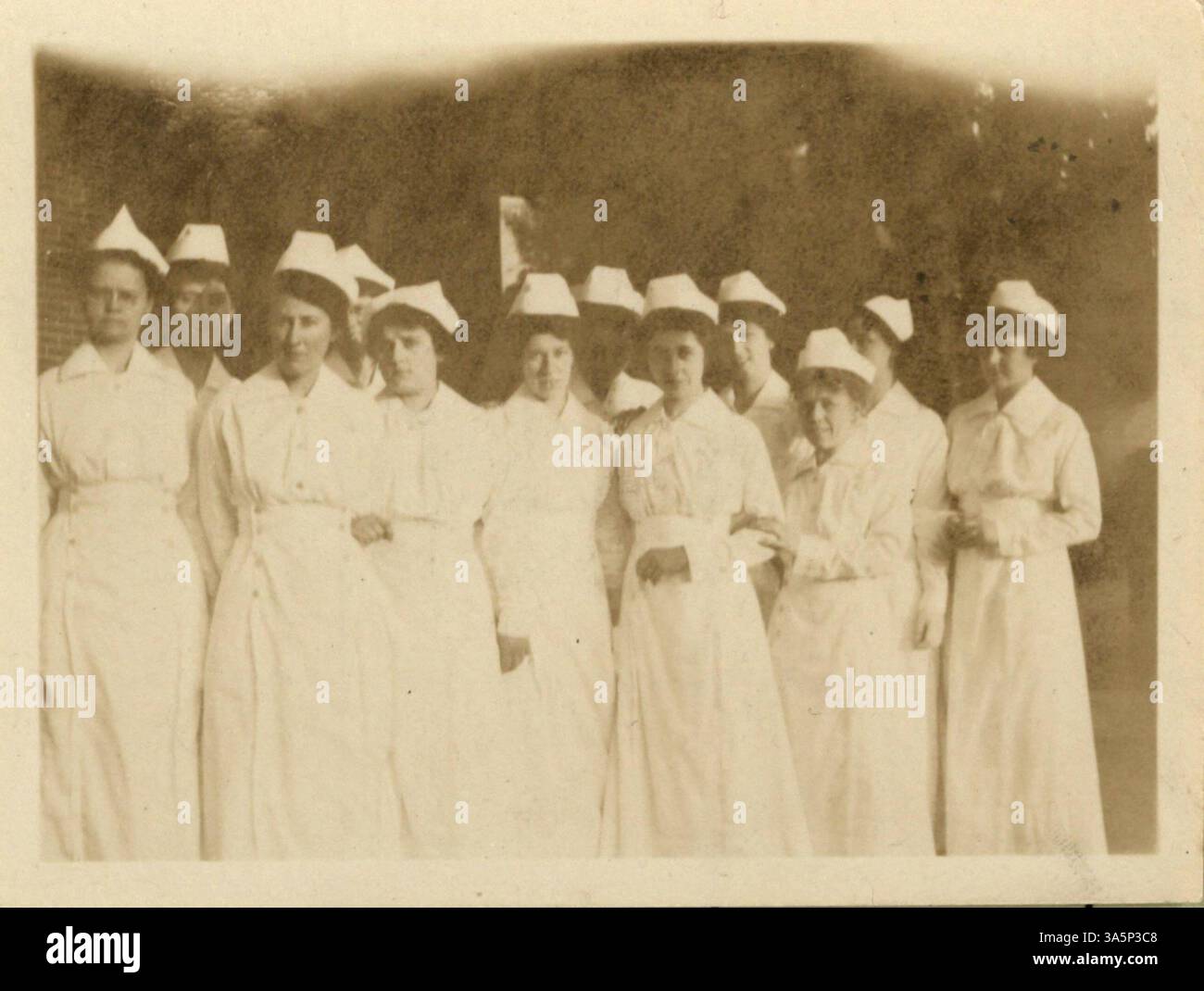The photograph features students at Asbury Hospital Nursing School ...