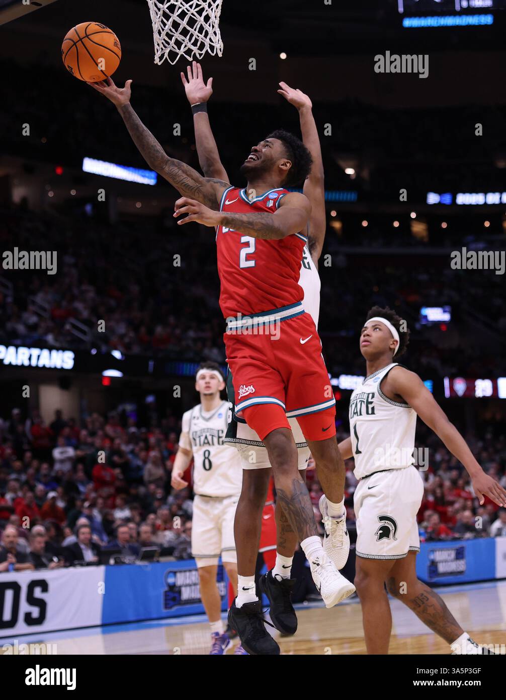 Cleveland, United States. 23rd Mar, 2025. New Mexico guard Donovan Dent ...