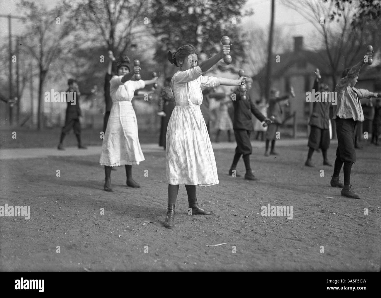 Features a group of students participating in school activities hi-res ...