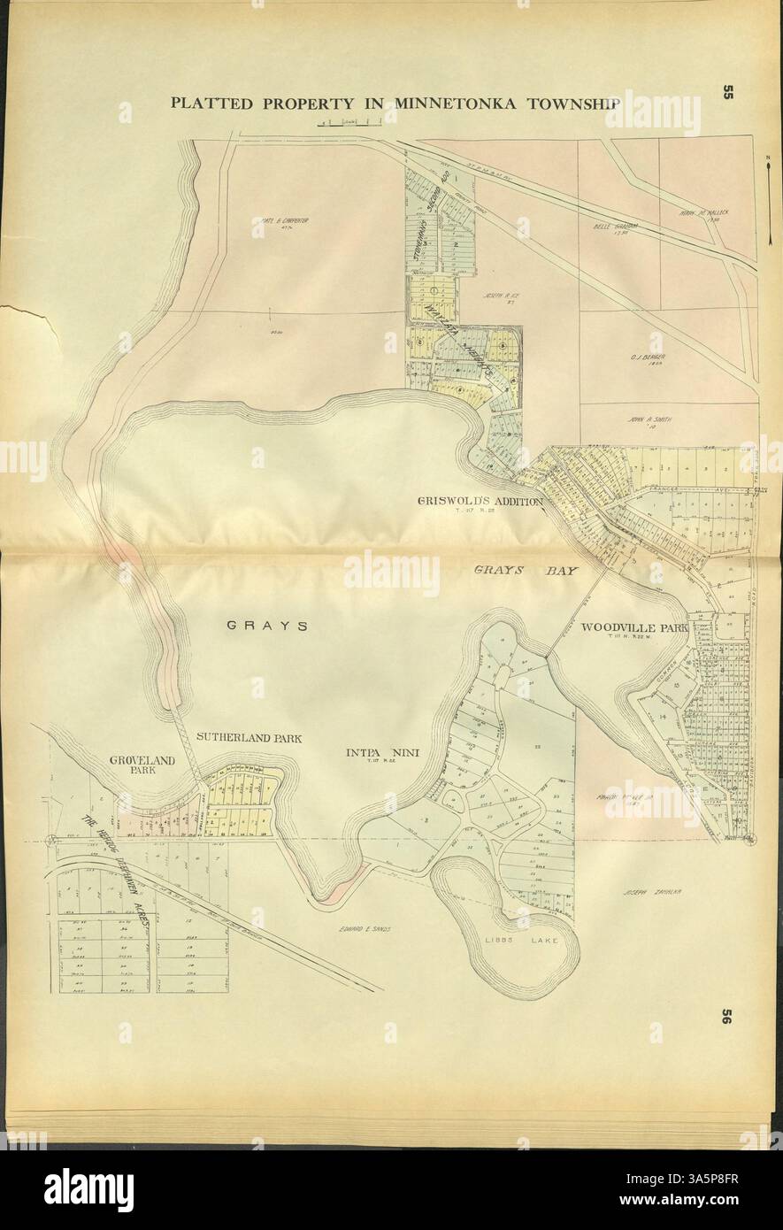 This atlas offers a detailed compilation of surveys and plats for ...