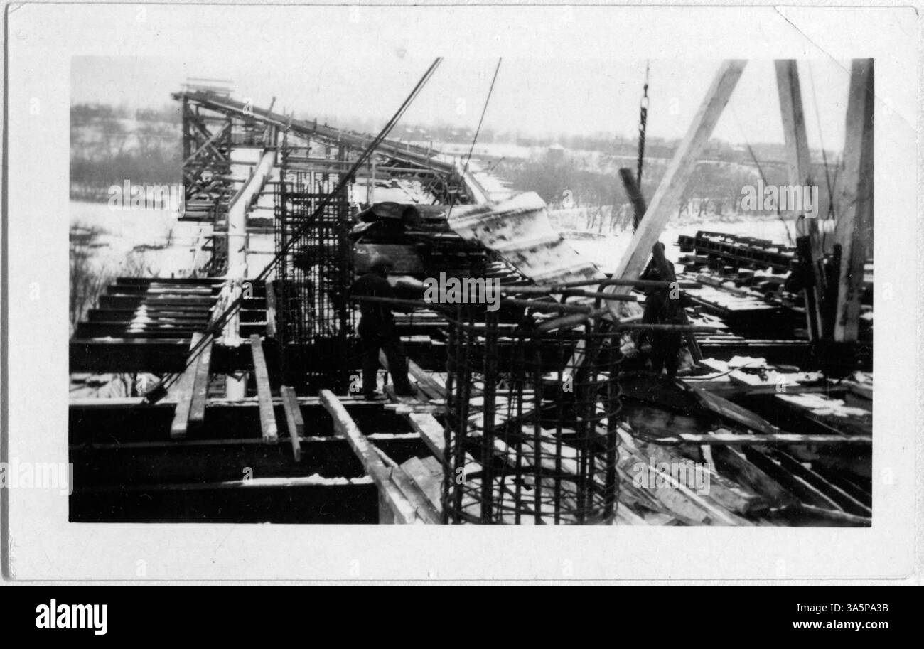 Construction work on the Mendota Bridge is underway, with scaffolding ...