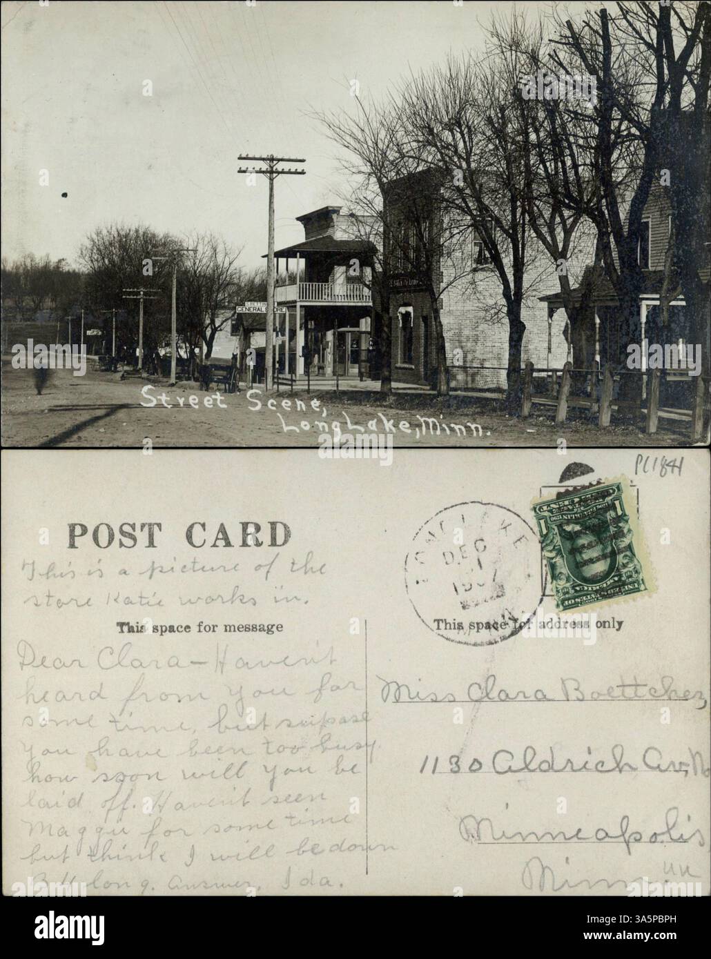 This historical photograph from Long Lake, Minnesota, depicts a street ...