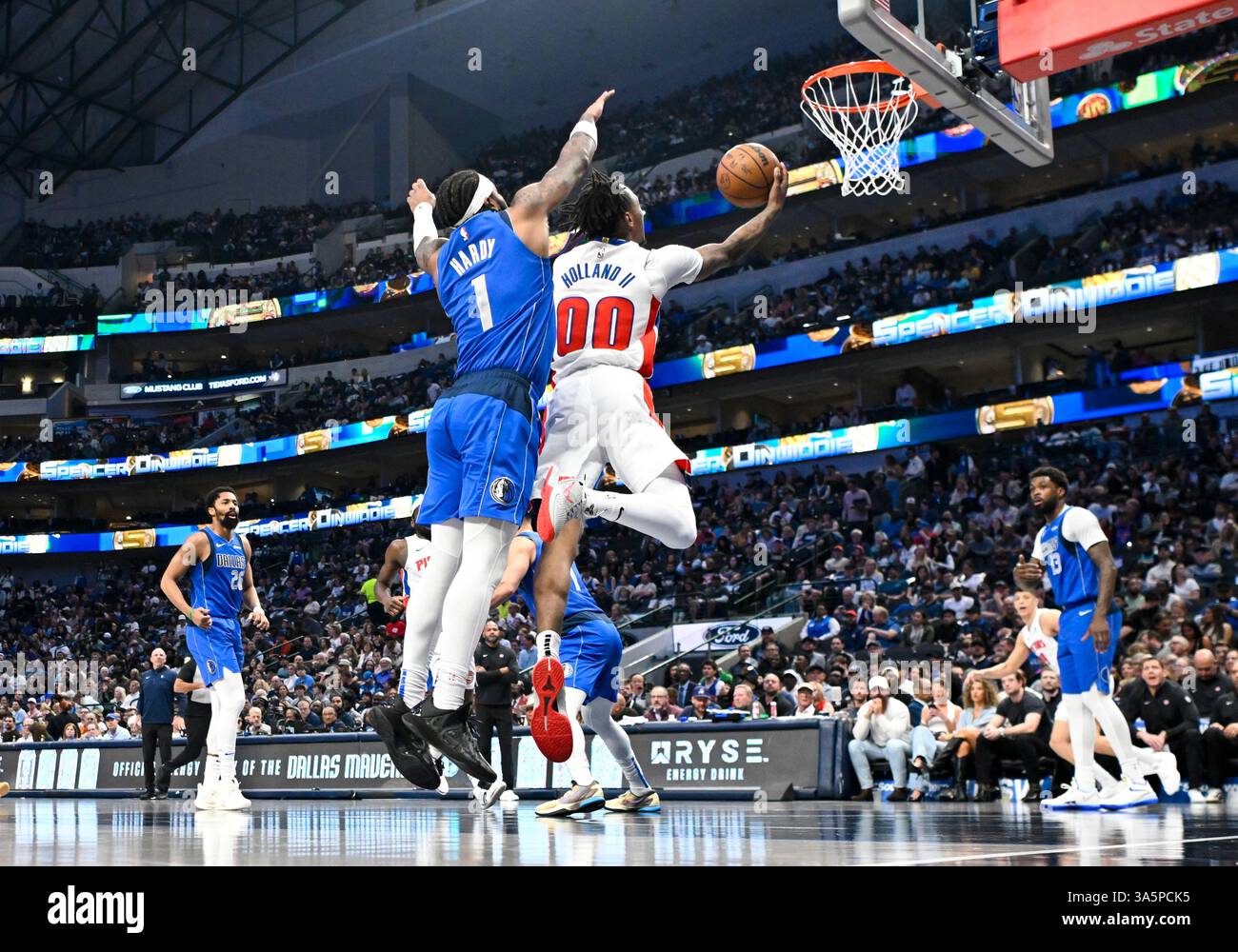 Detroit Pistons forward Ronald Holland II drives past Dallas Mavericks ...