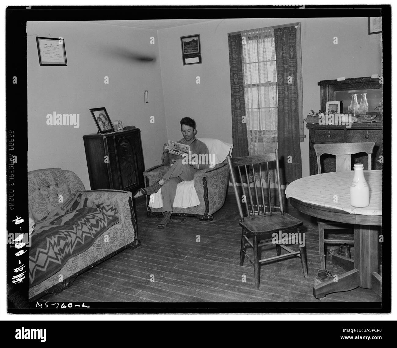 The living-dining room in a miner’s home in a company housing project at Stansbury Mine in ...