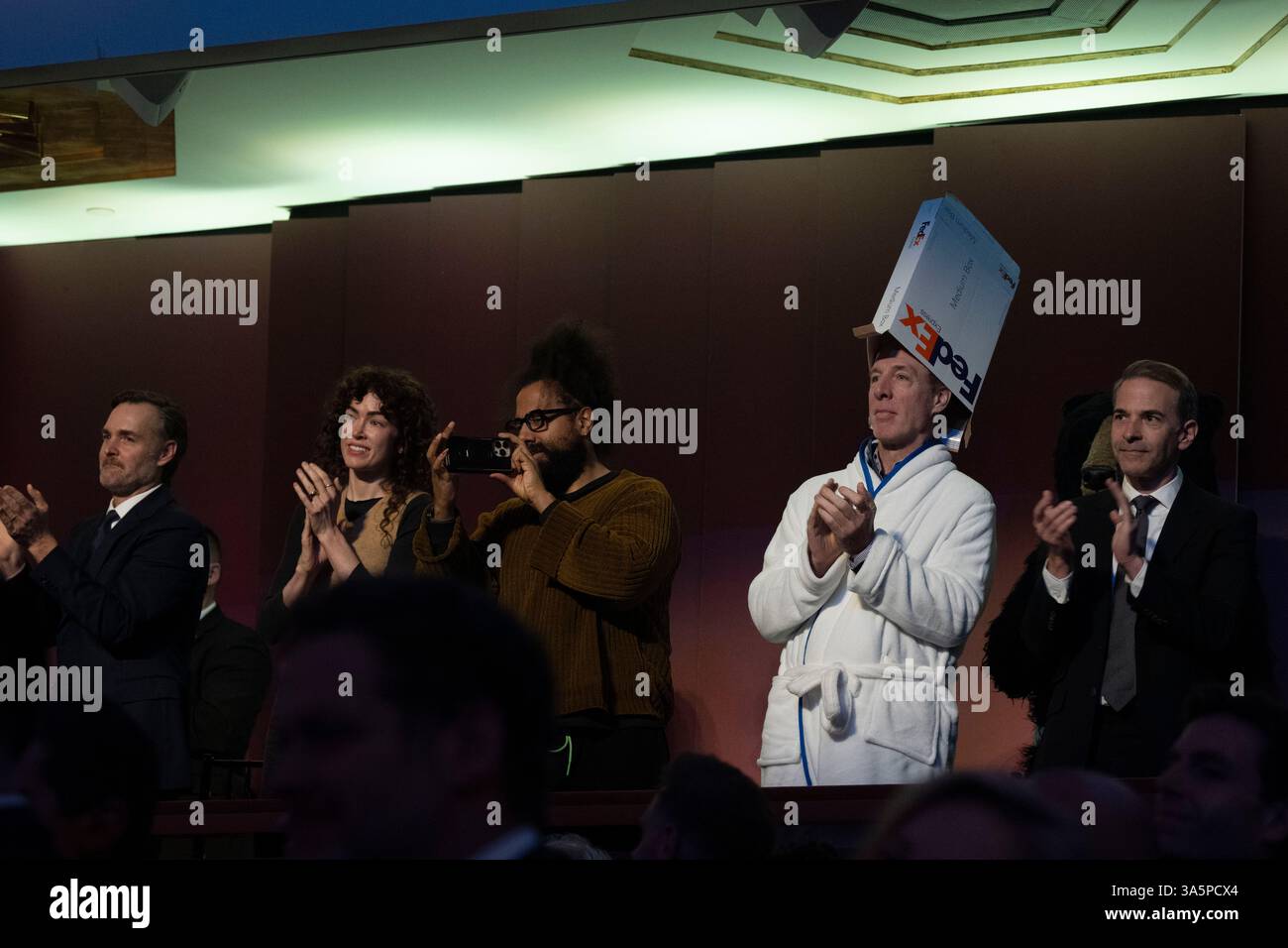 Brian McCann, dressed as the FedEx Pope, looks to Conan O'Brien at the ...