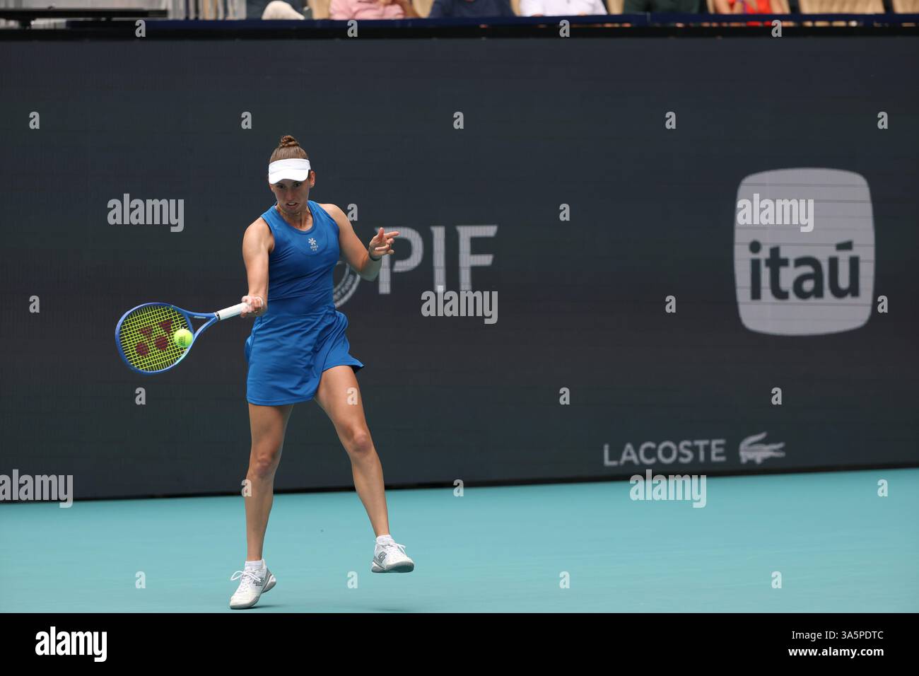 MIAMI GARDENS, FLORIDA - MARCH 23: Iga Swiatek of Poland defeats Elise Mertens of Belgium in the ...