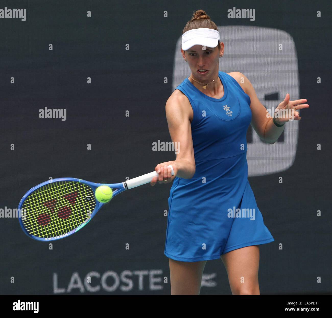 MIAMI GARDENS, FLORIDA - MARCH 23: Iga Swiatek of Poland defeats Elise Mertens of Belgium in the ...