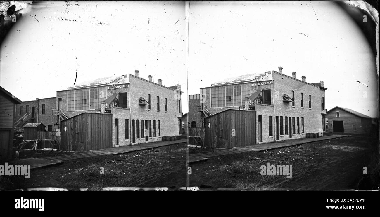 Jacob's Photo Gallery, photographed in 1878, features a man using a ...