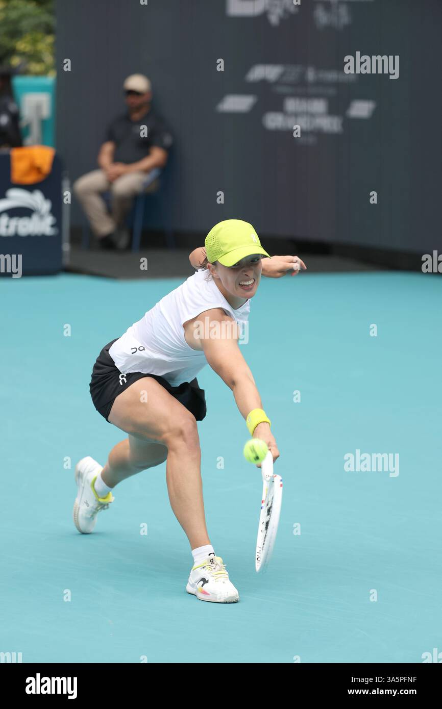 MIAMI GARDENS, FLORIDA - MARCH 23: Iga Swiatek of Poland defeats Elise Mertens of Belgium in the ...