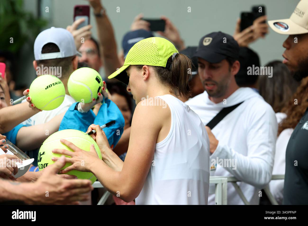 MIAMI GARDENS, FLORIDA - MARCH 23: Iga Swiatek of Poland defeats Elise Mertens of Belgium in the ...