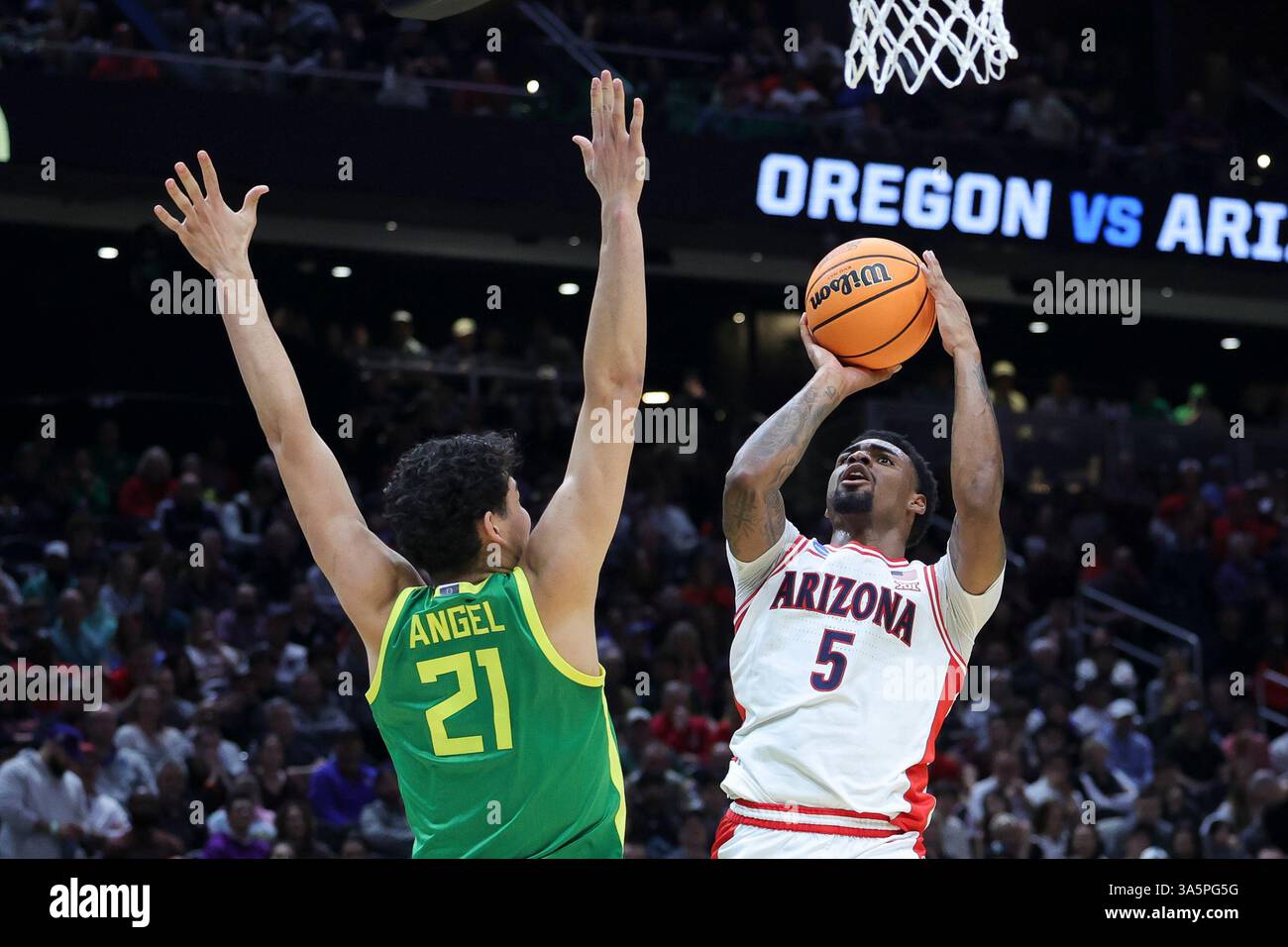 Arizona guard KJ Lewis (5) shoots against Oregon forward Brandon Angel ...