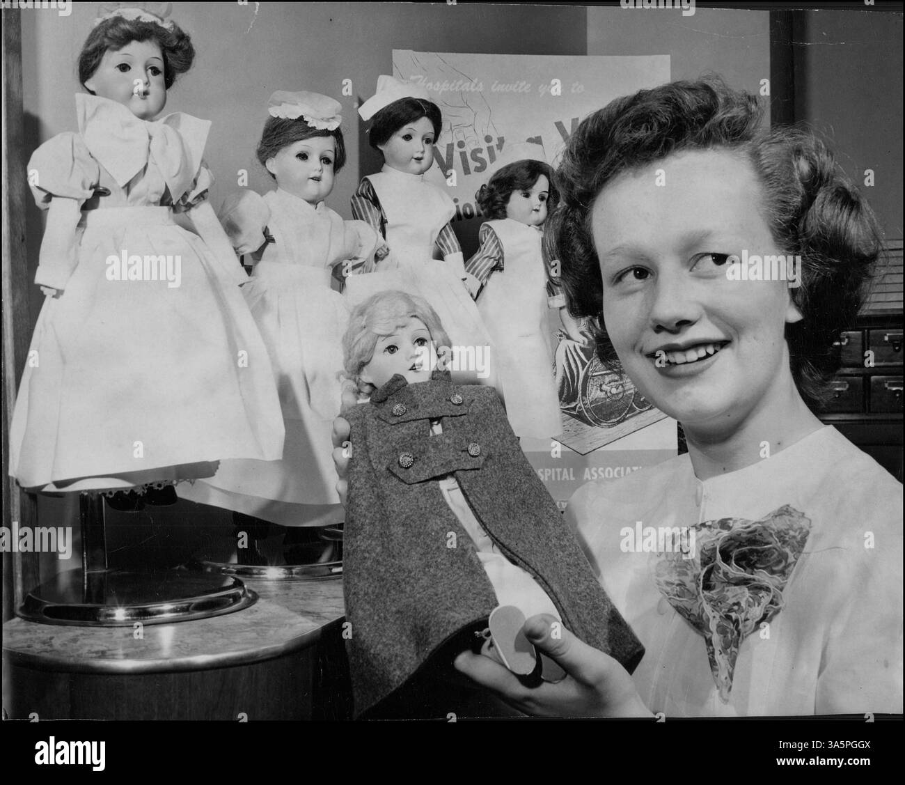 The evolution of nursing uniforms over time is displayed with dolls ...