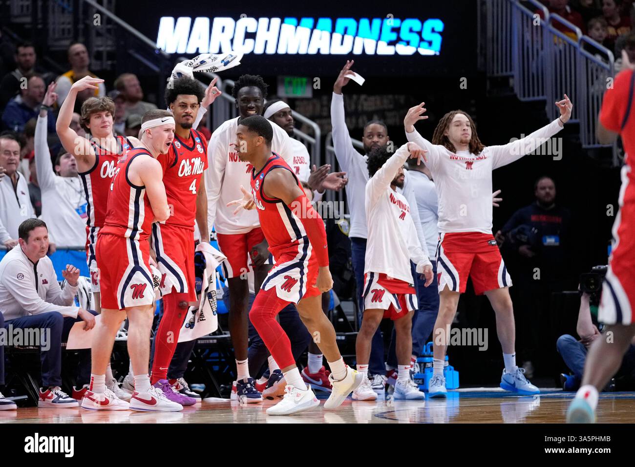 Mississippi guard Matthew Murrell, front center, reacts to scoring a 3 ...