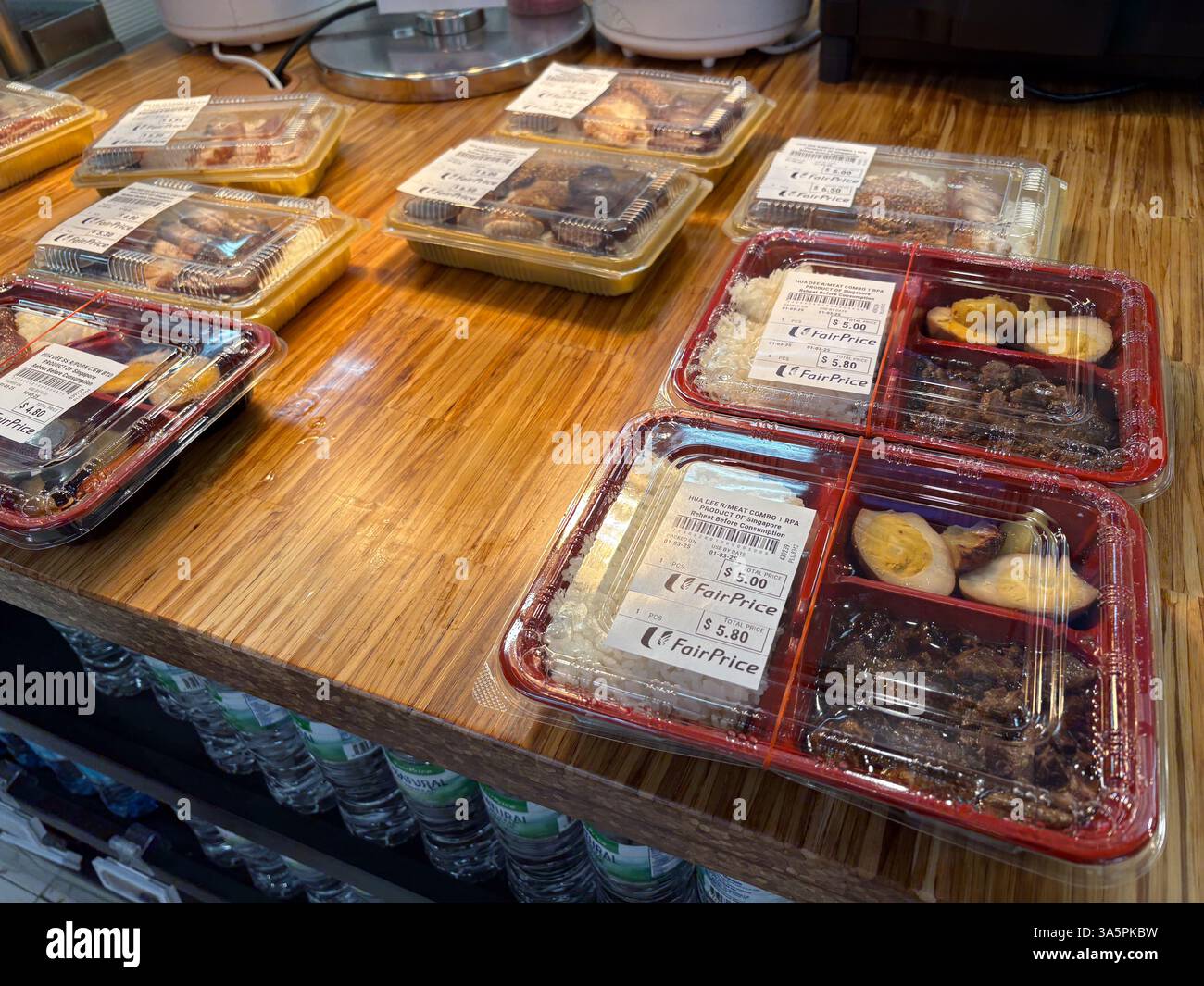 Discounted bento meal boxes for sale at a grocery store in Singapore ...
