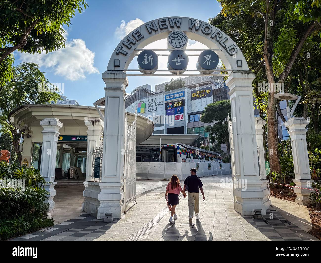 Farrer Park MRT Station entrance in Singapore with a couple walking ...