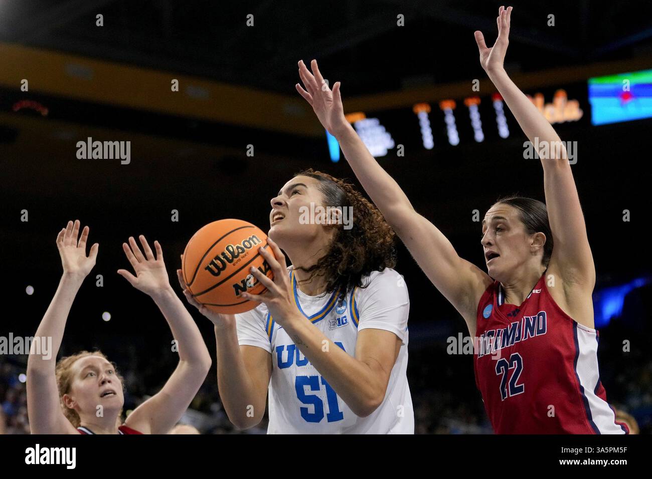 UCLA center Lauren Betts (51) goes to the basket against Richmond ...