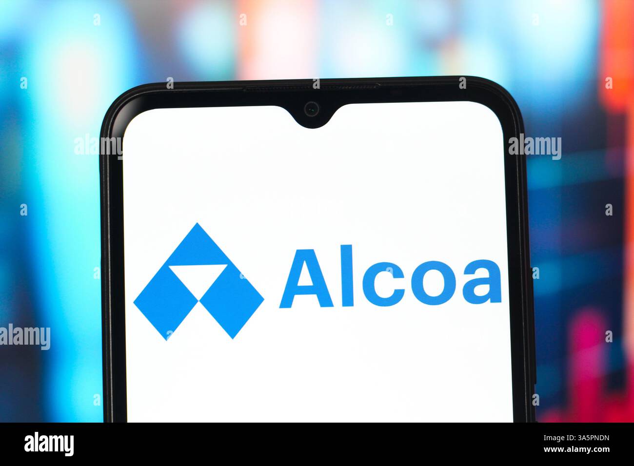 In this photo illustration, the Alcoa logo is seen displayed on a ...