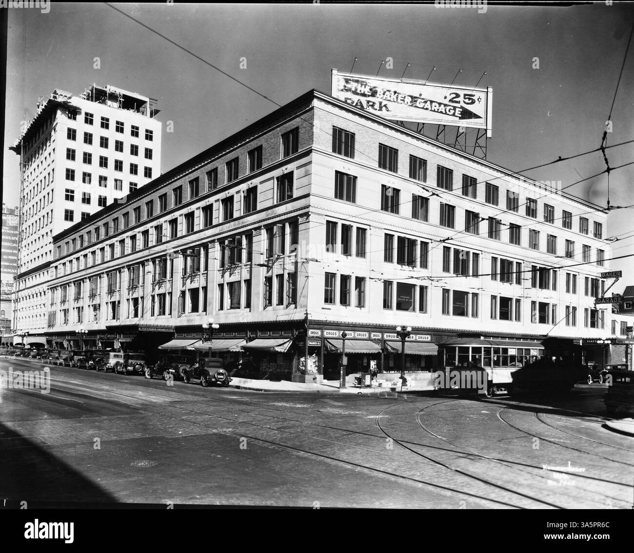 This image captures the Baker Building under construction, with a ...