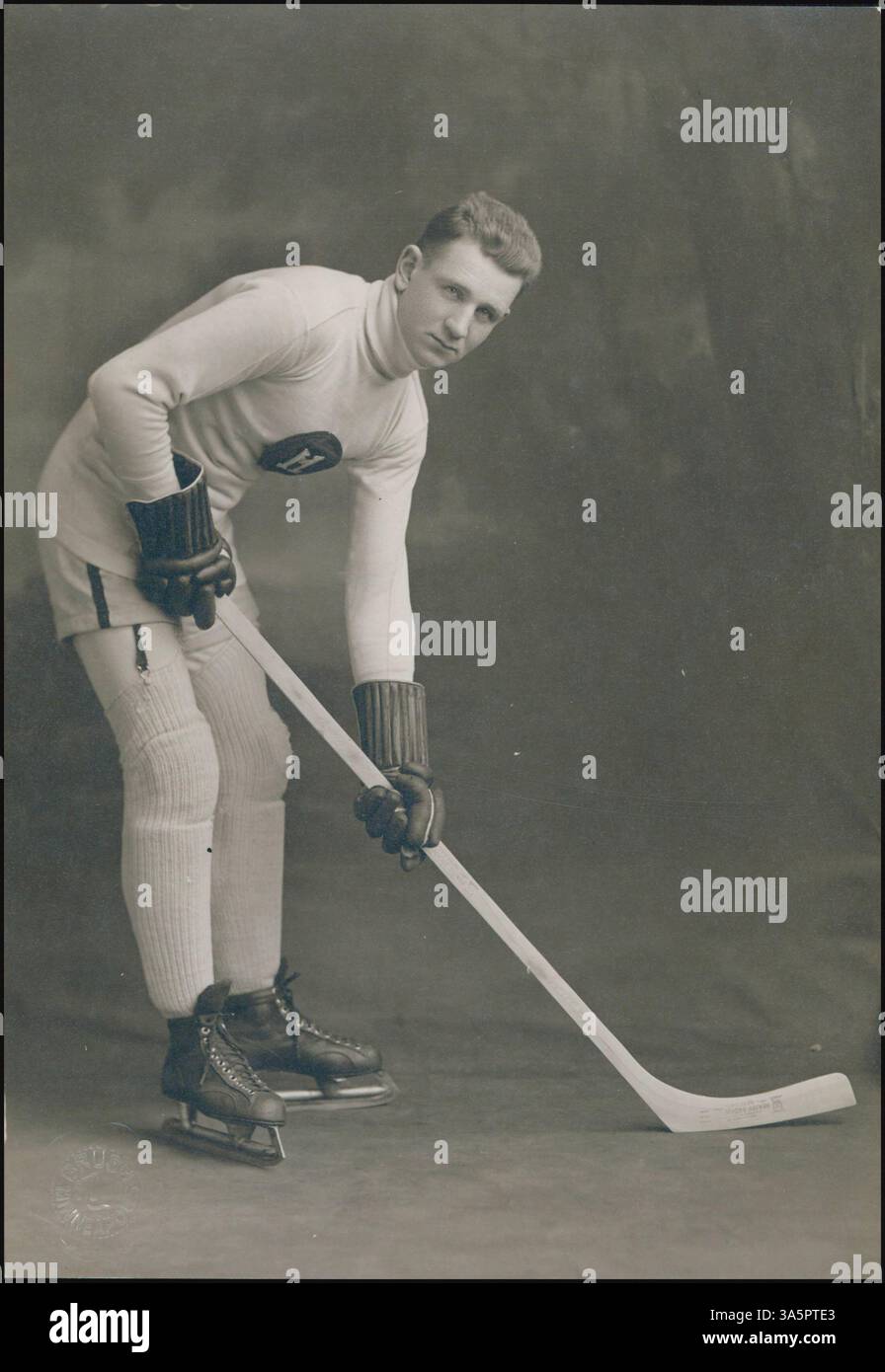 Bob Flanagan, a player for the Minneapolis Millers hockey team, is ...