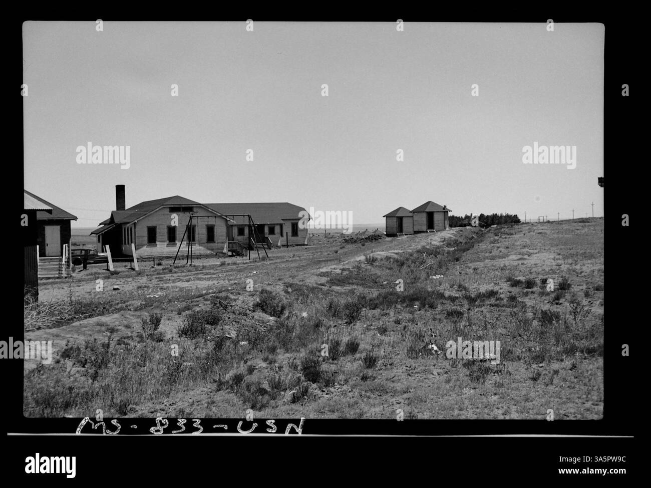 A photograph depicting a coal mining community, showcasing the living ...