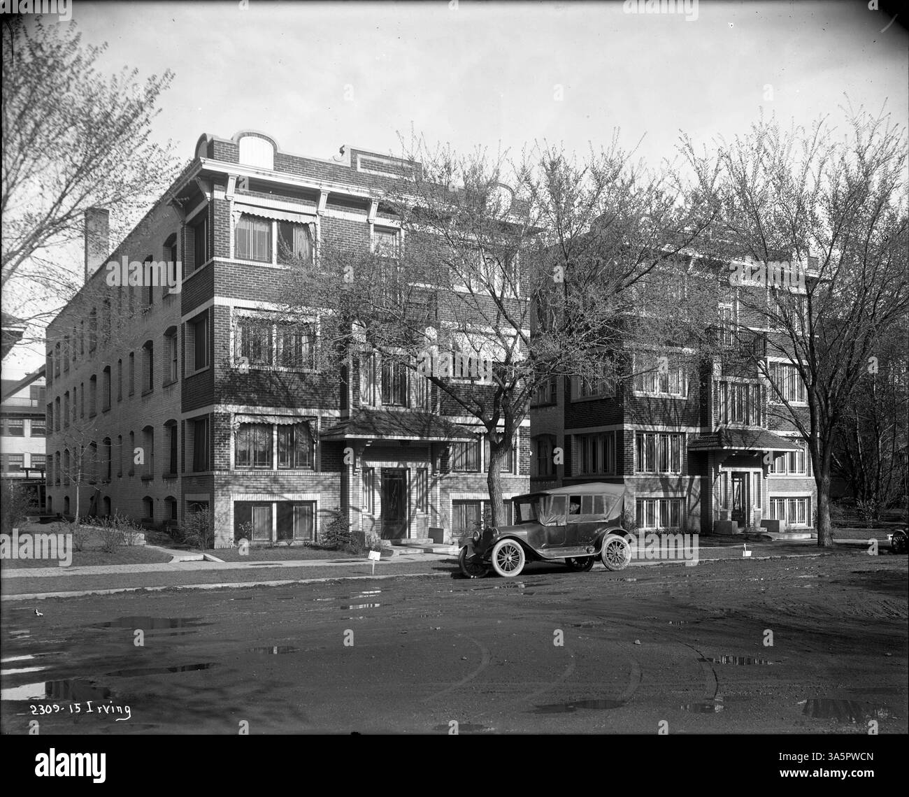 This photograph showcases apartment buildings located on Irving Avenue ...
