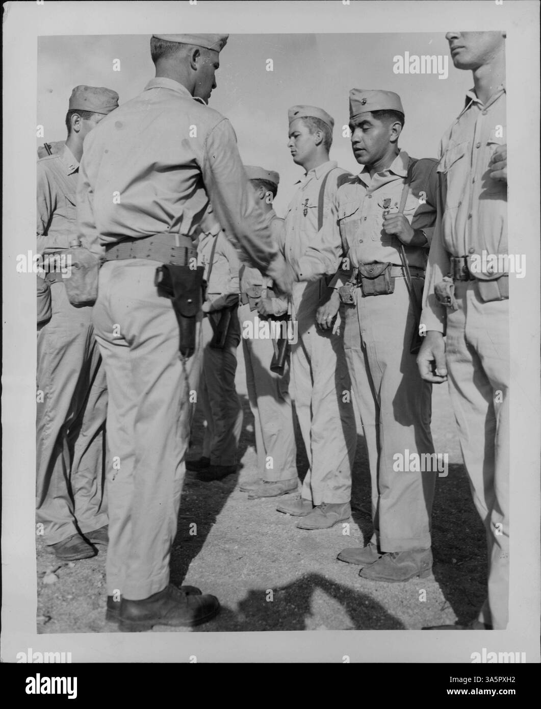 Marine Corps veteran Jesus J. Mercado, from St. Paul, receives the ...