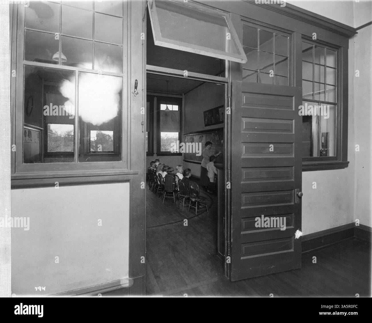 The image depicts the interior of a classroom at Rosedale School ...