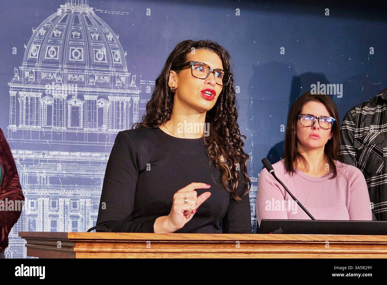 FILE - Minnesota Democratic State Senator Erin Maye Quade, center ...