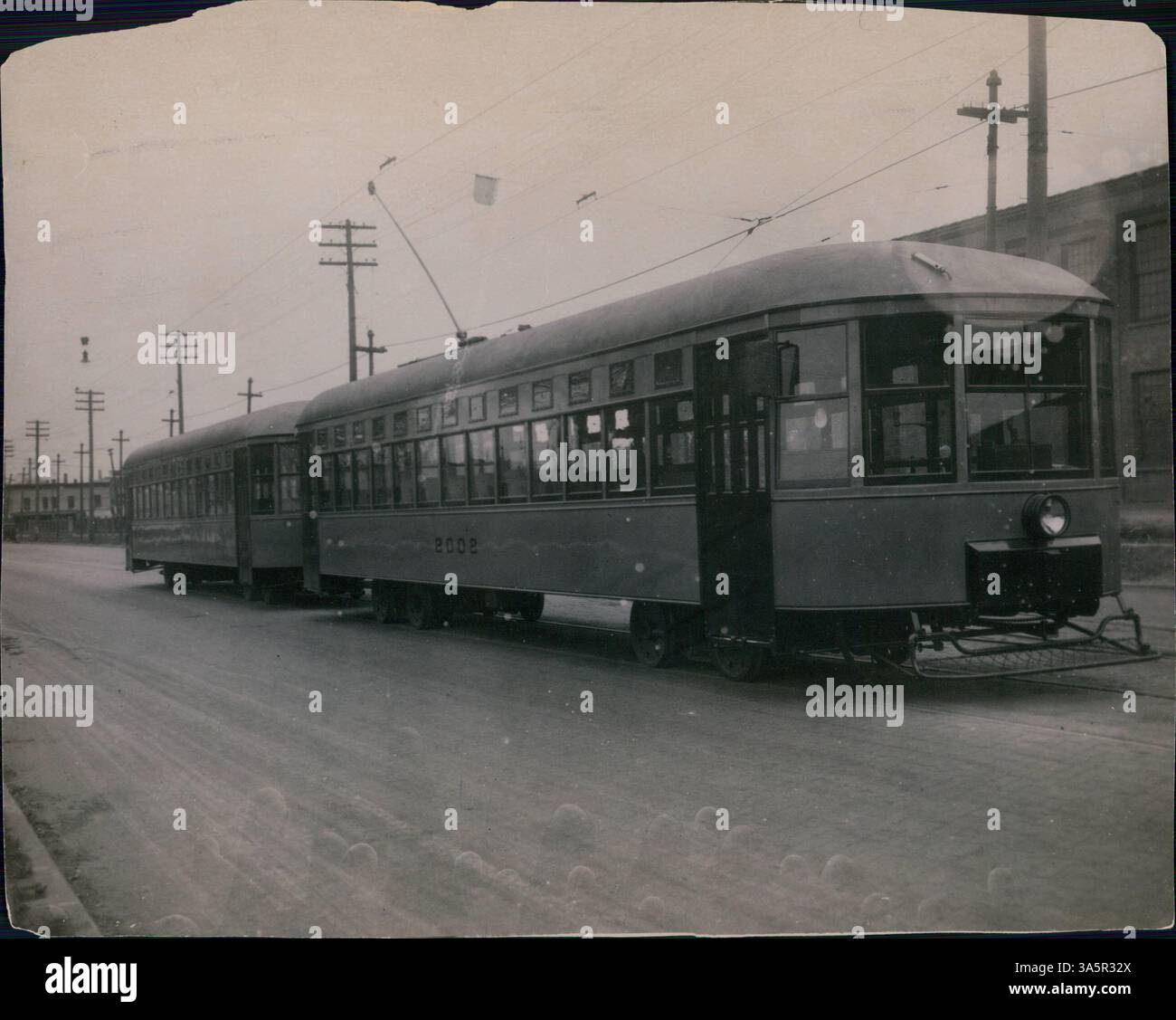 A depiction of trolley cars, part of the urban transportation system in ...