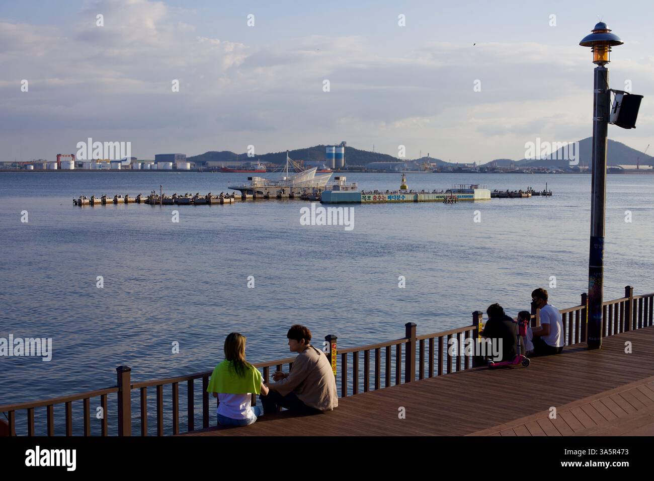 Mokpo City, South Korea - September 25, 2020: Visitors relax along the ...