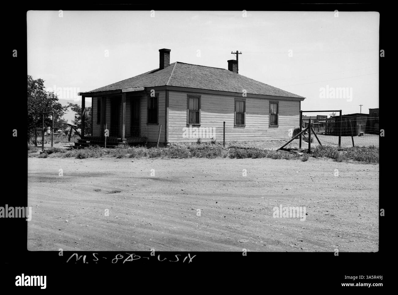A photograph showing a mining community in the 1940s, with workers ...