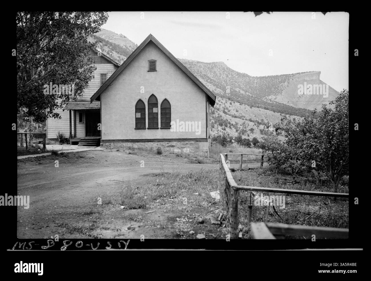A photograph capturing daily life in a mining community, highlighting ...