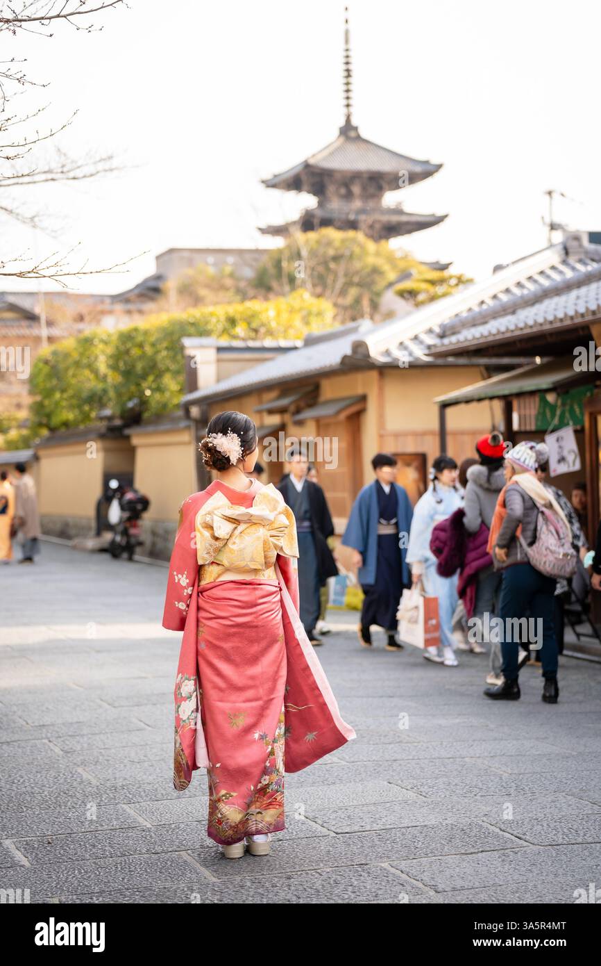 Traditional Elegance in Kyoto. A Woman in Elegant Pink Traditional ...