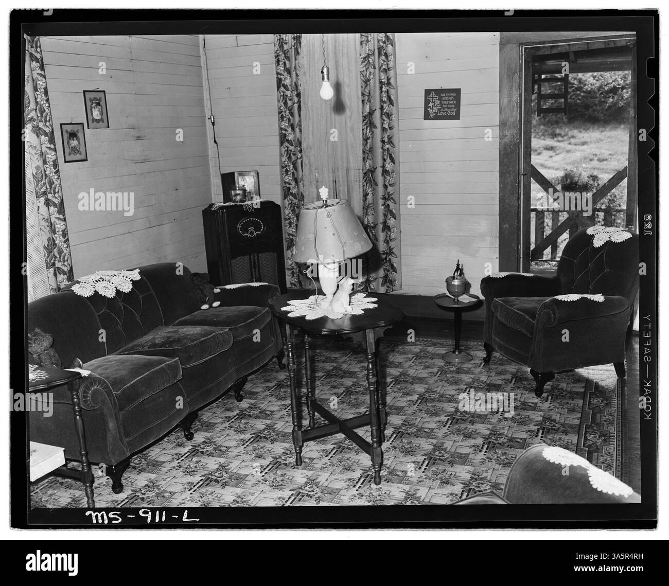 This 1946 image shows the living room in the home of Mrs. Murray, wife ...