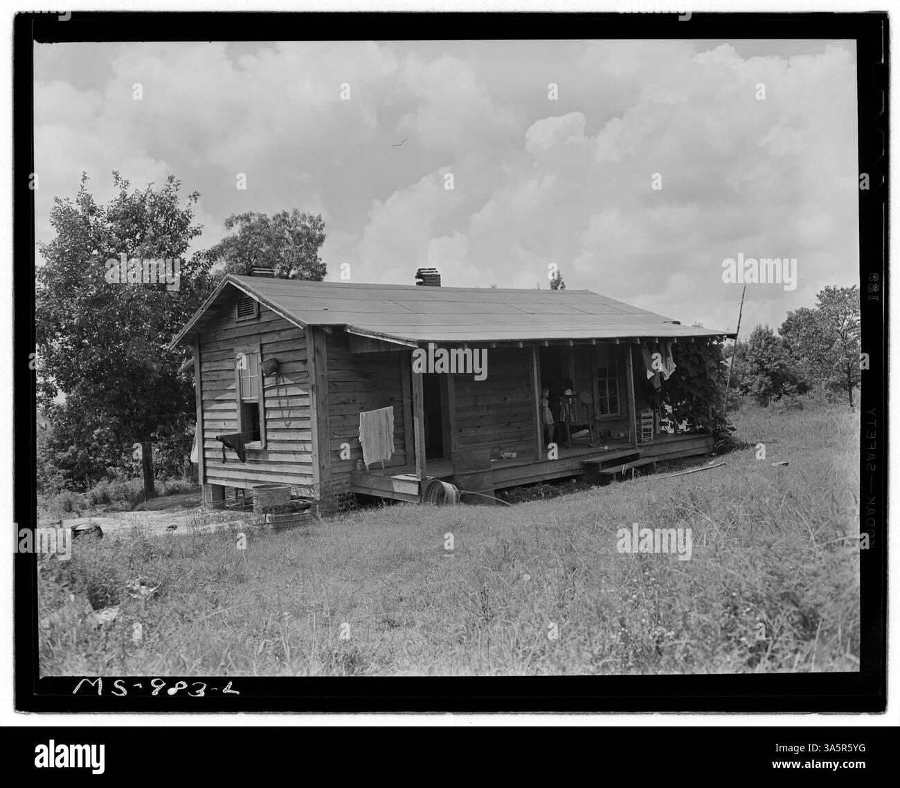 The home of Andrew Dutton, a miner, is located in a company housing ...