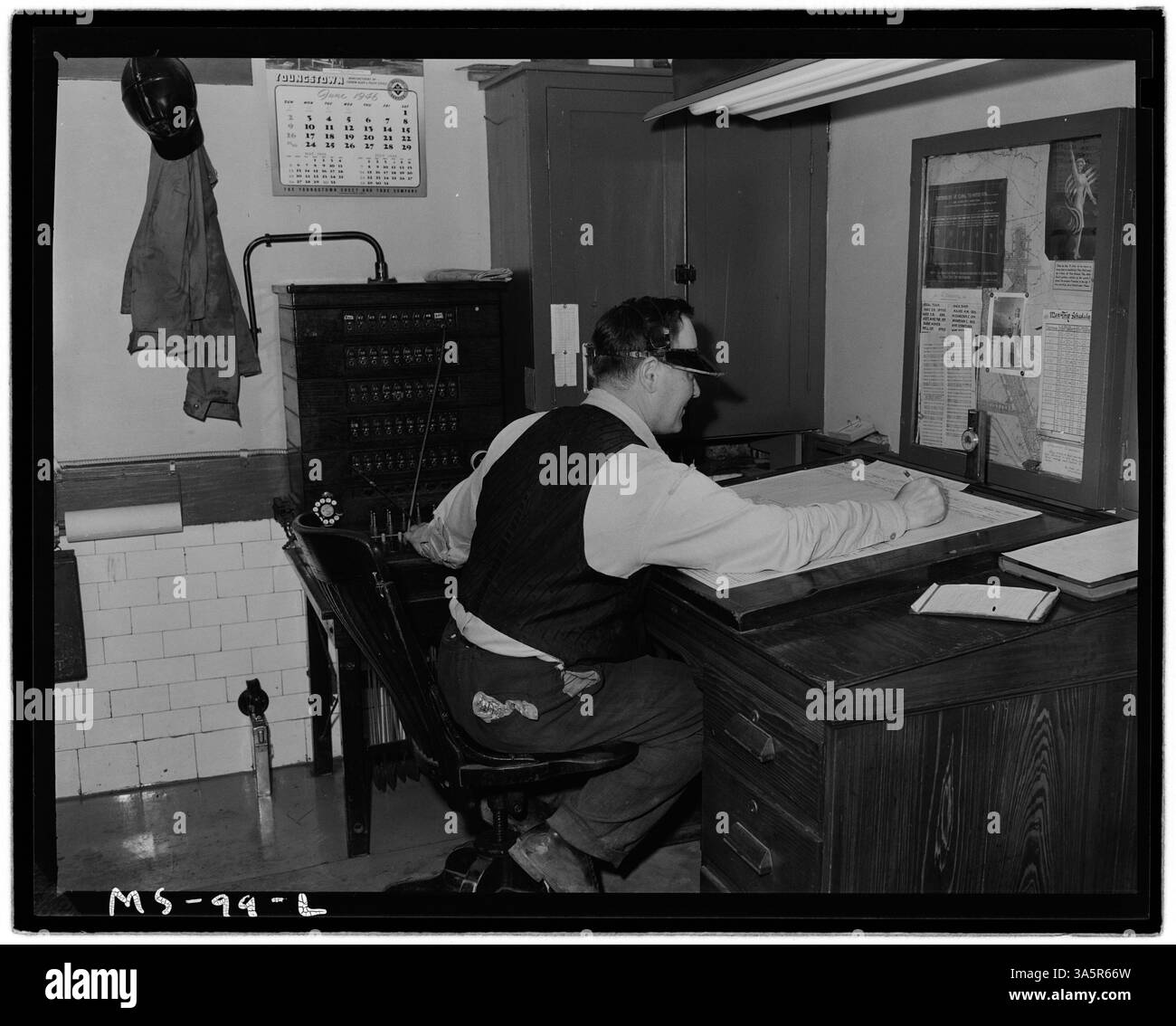 Joseph Popson, a switchboard operator, works in the underground central ...