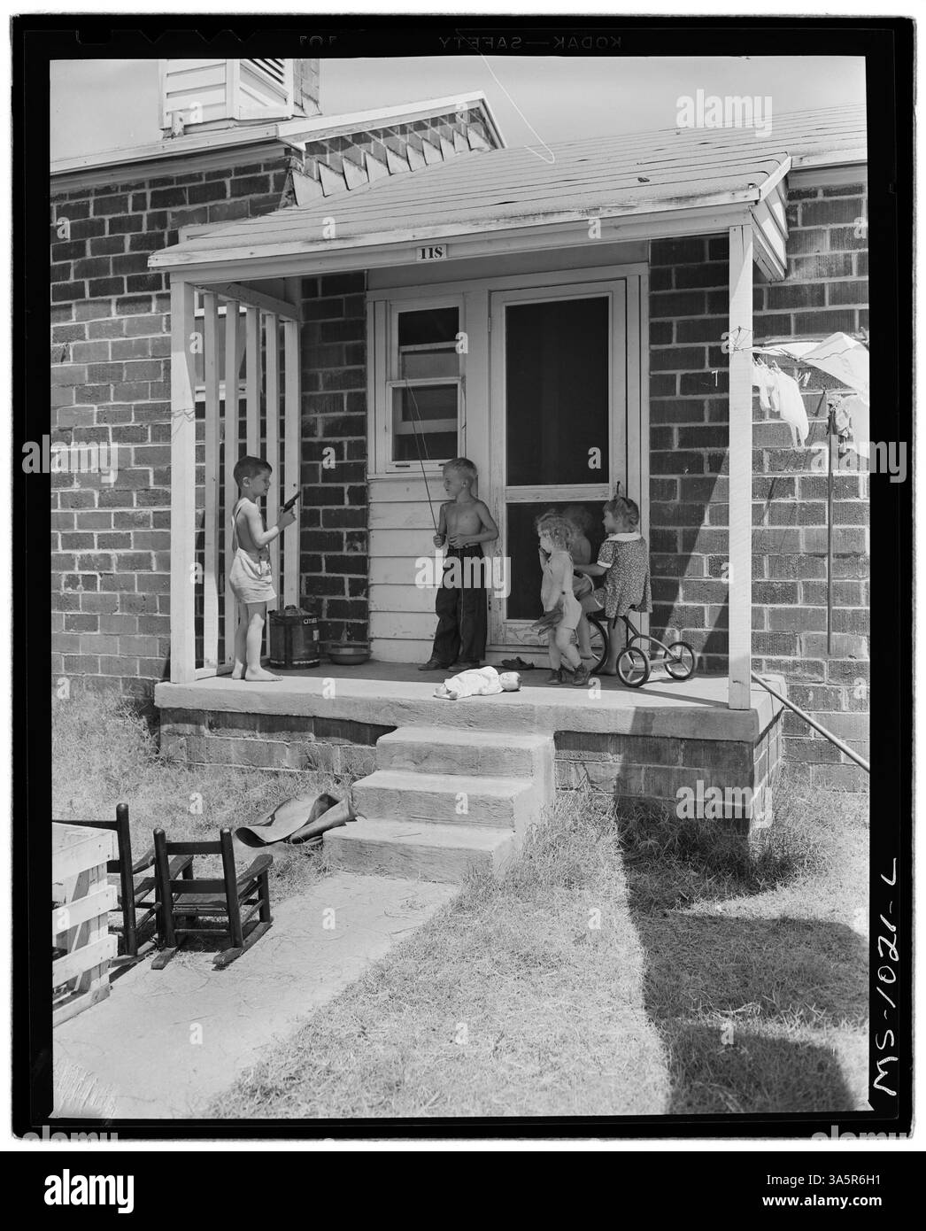 The front porch of a home in a government housing project, now ...