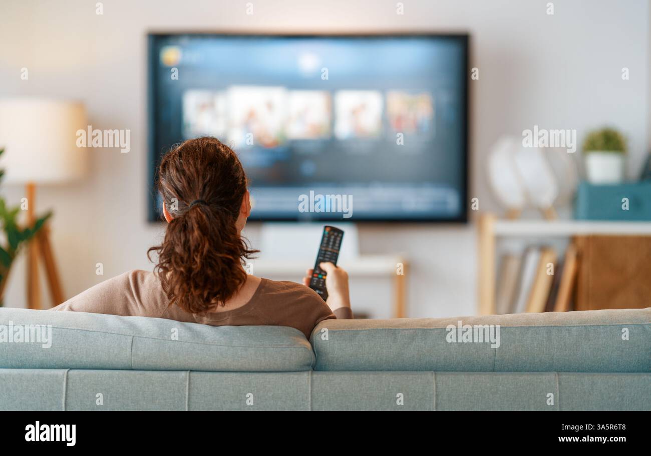 Watching movies spending time hi-res stock photography and images - Alamy