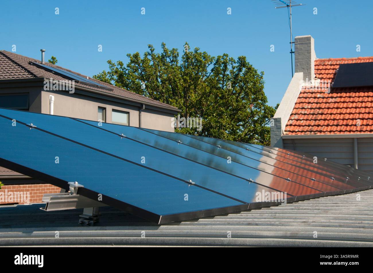 Solar energy collector panels angled to optimise north-facing solar ...