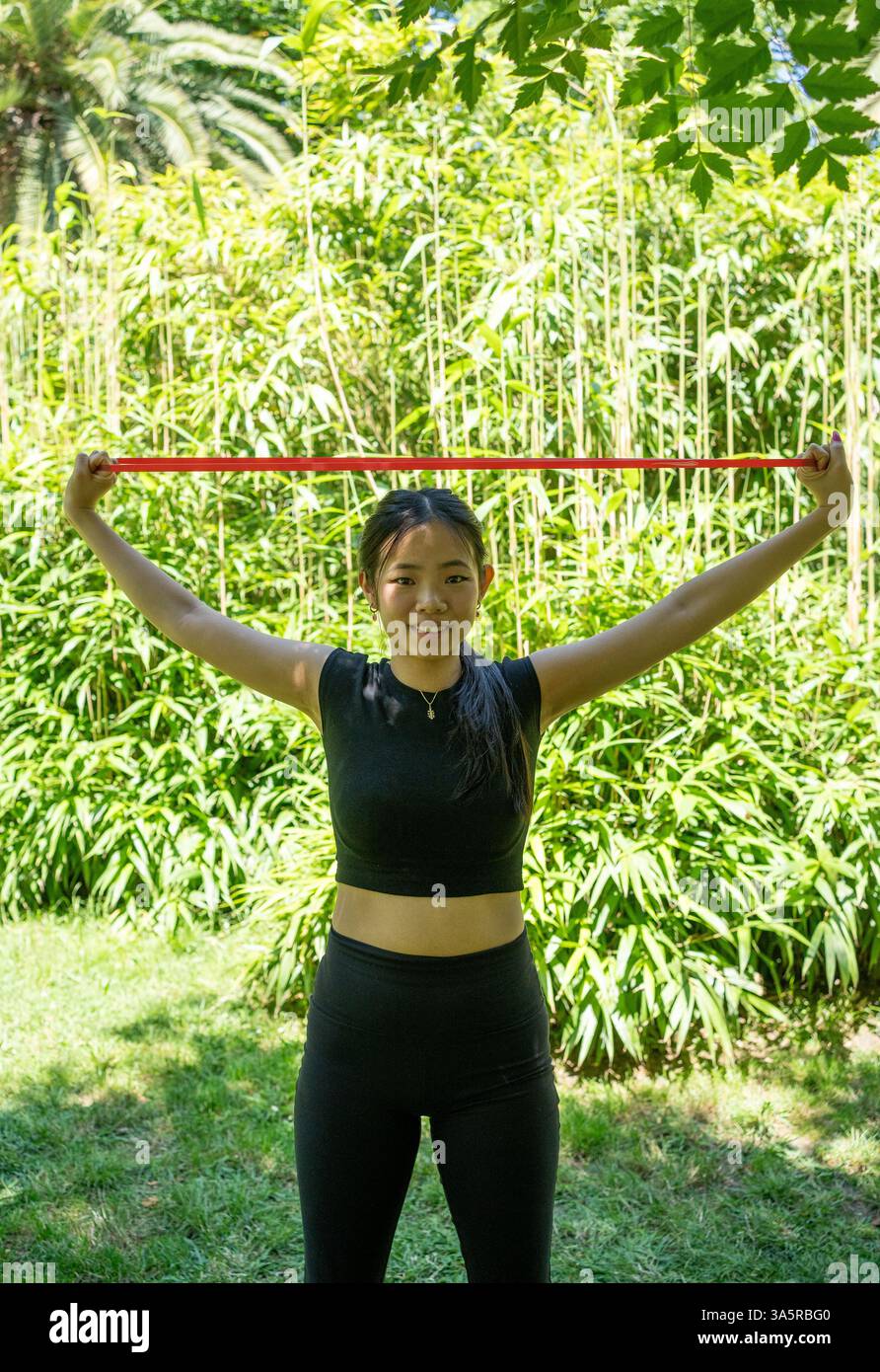 Engaging in Outdoor Fitness Activities with Resistance Bands to Achieve ...