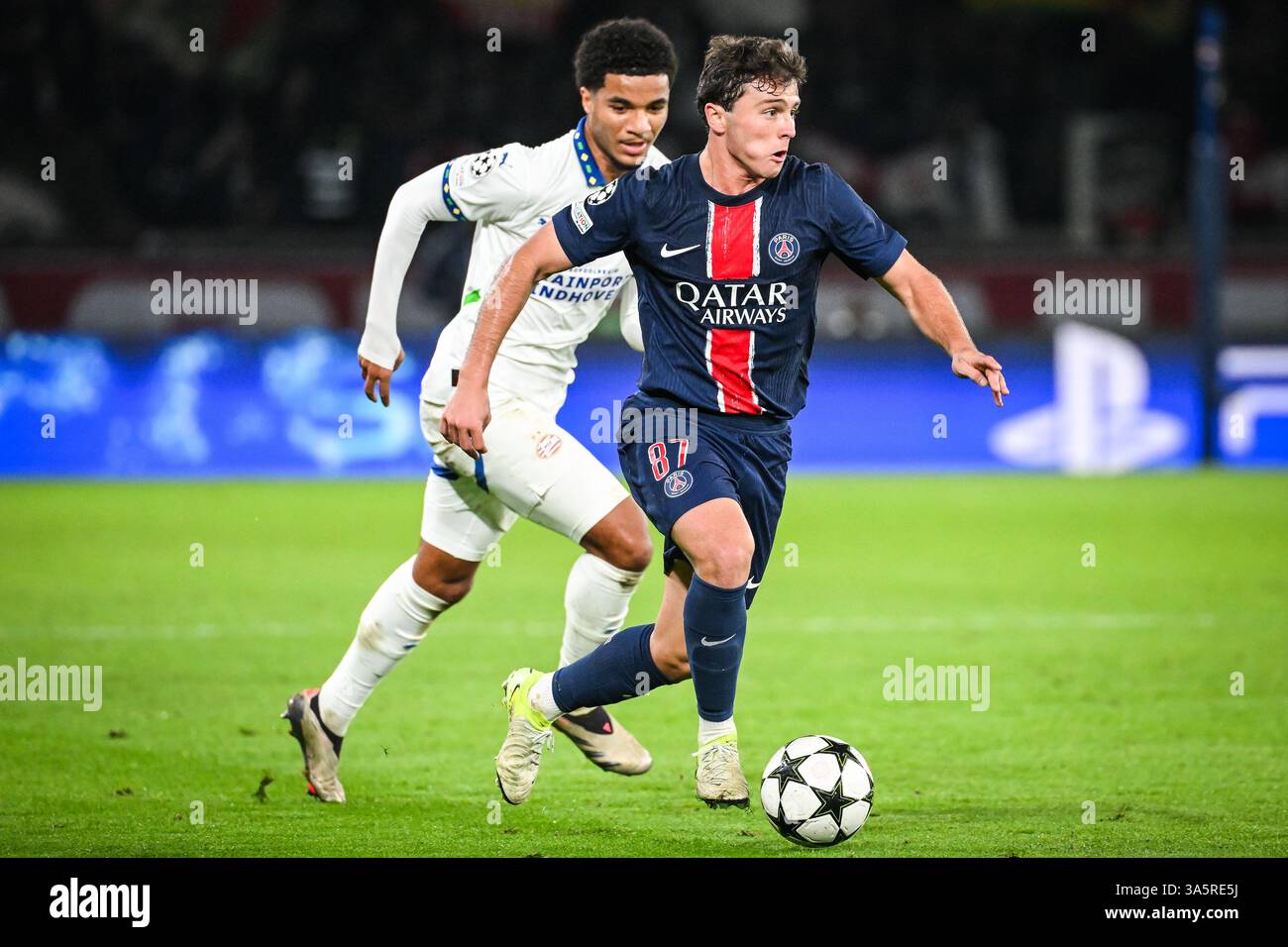 Paris, France. 22nd Oct, 2024. Malik TILLMAN of PSV Eindhoven and Joao NEVES of PSG during the ...
