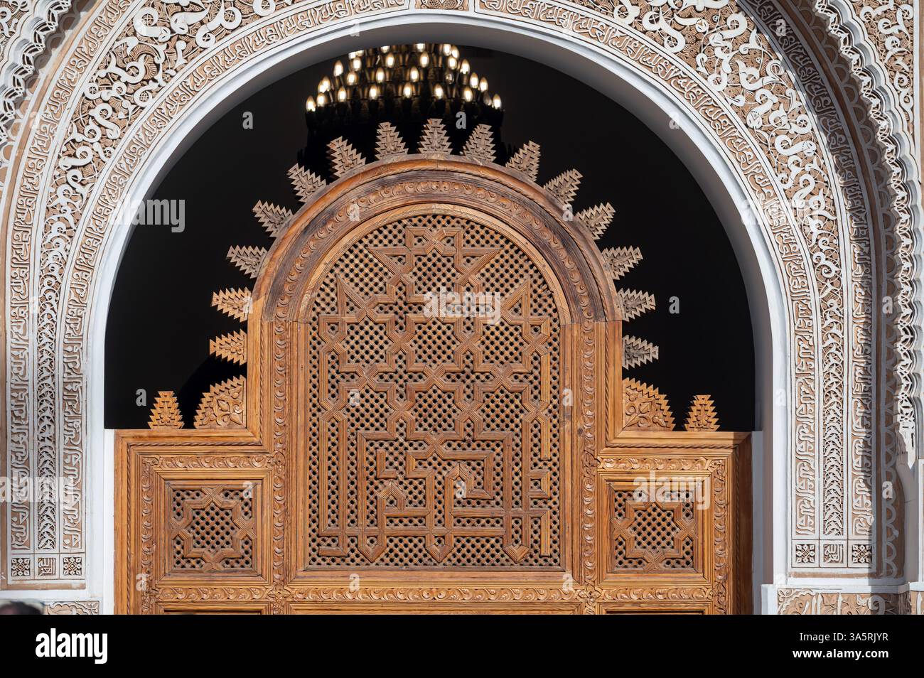 Ornate wooden archway showcases intricate craftsmanship in Marrakech's ...