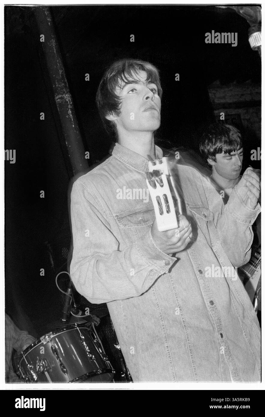 OASIS, FIRST NATIONAL TOUR, 1994: Liam Gallagher and Noel Gallagher of Oasis at The Fleece and ...