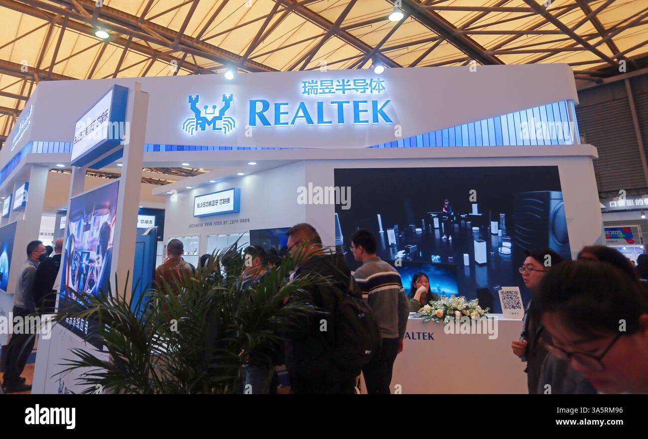 SHANGHAI, CHINA - MARCH 20, 2025 - Visitors look at the booth of ...
