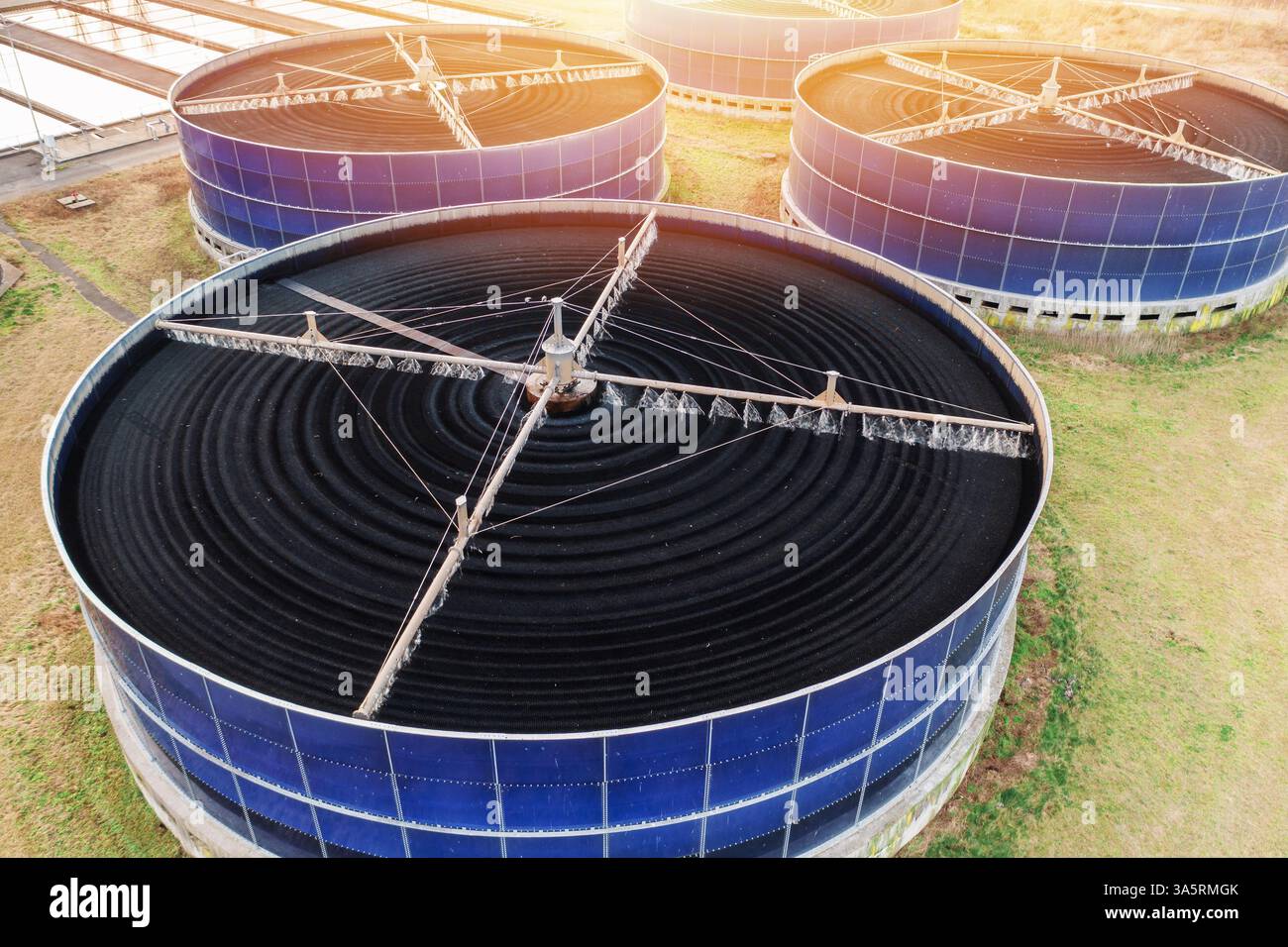 Aerial view large circular biofilter tanks at wastewater treatment ...